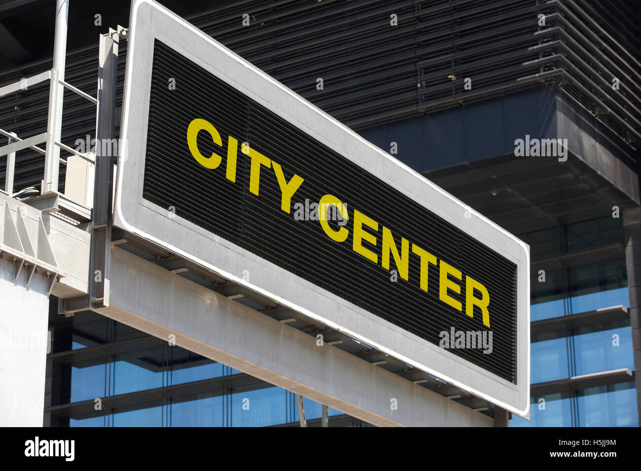 City center signpost in the city with building facade background ...