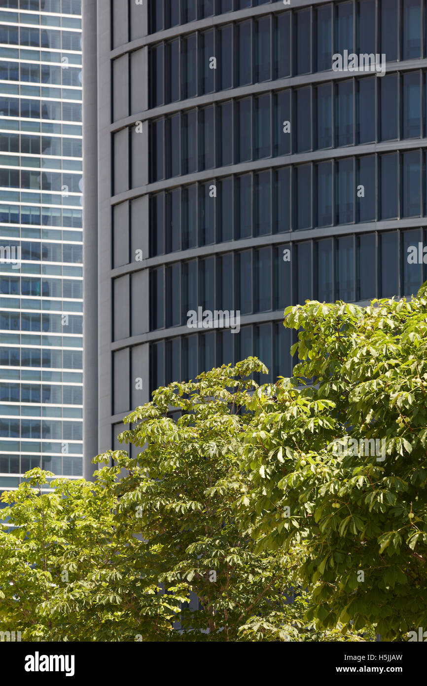 Trees and modern building facades in Madrid, Spain. Vertical Stock ...