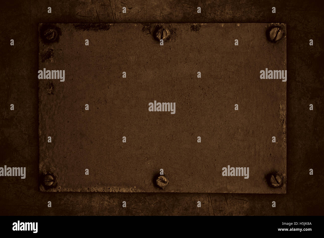brown steel plate with screws or abstract metal background Stock Photo ...
