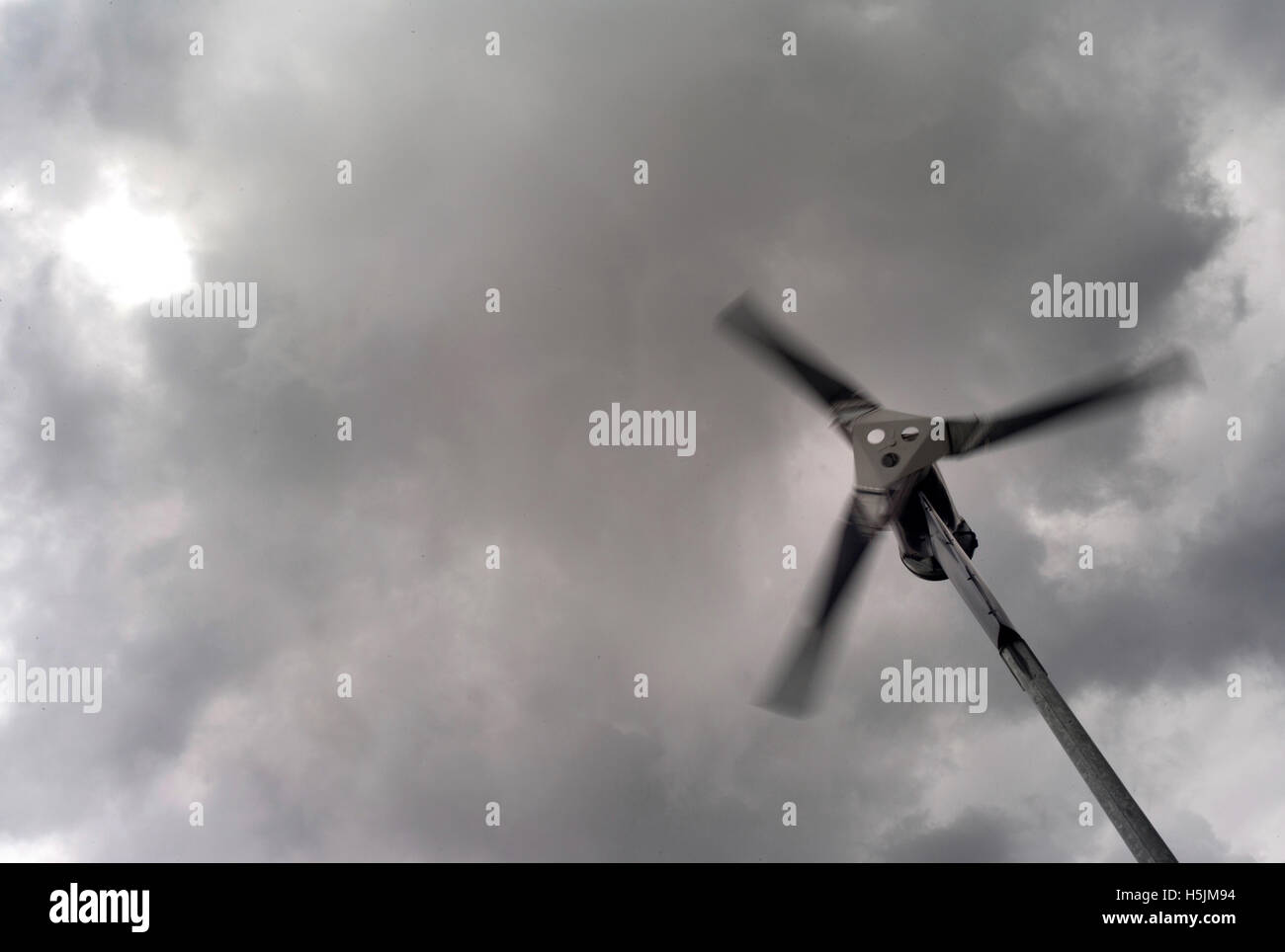 Spinning wind turbine Stock Photo - Alamy