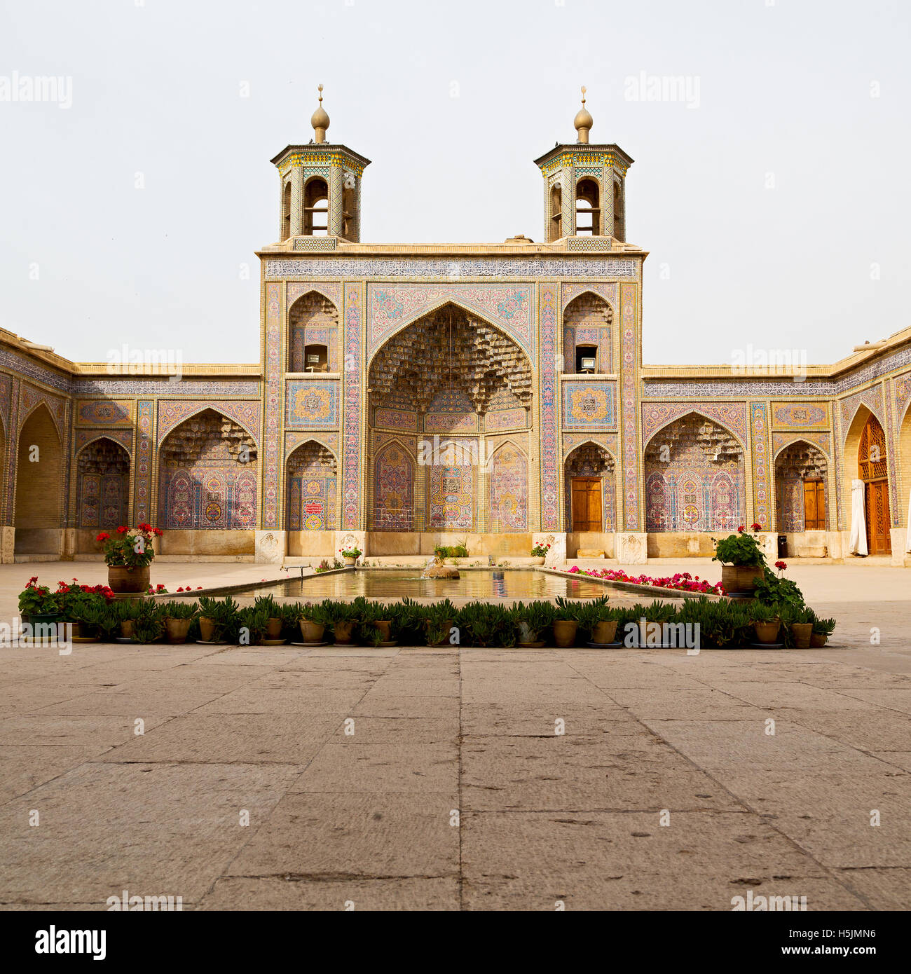 in iran the old mosque and traditional wall tile incision near minaret ...