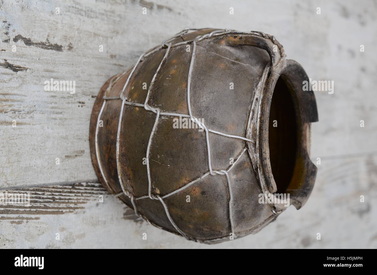 Old crocks. Ancient crocks and chatty in an old stone room with small ...