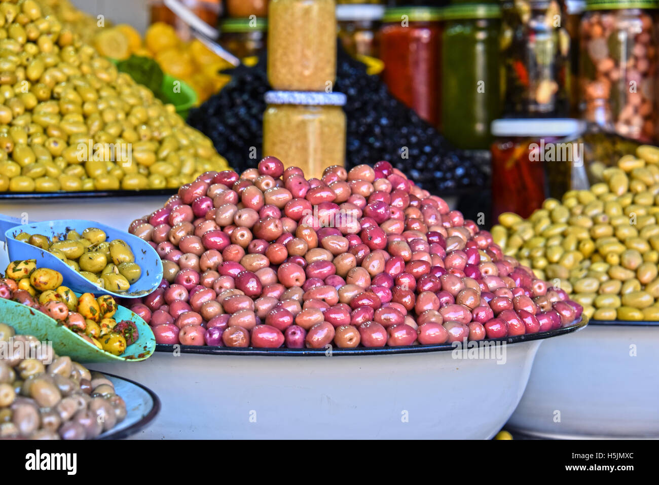 Assorted olives on the arab street market stall Stock Photo - Alamy