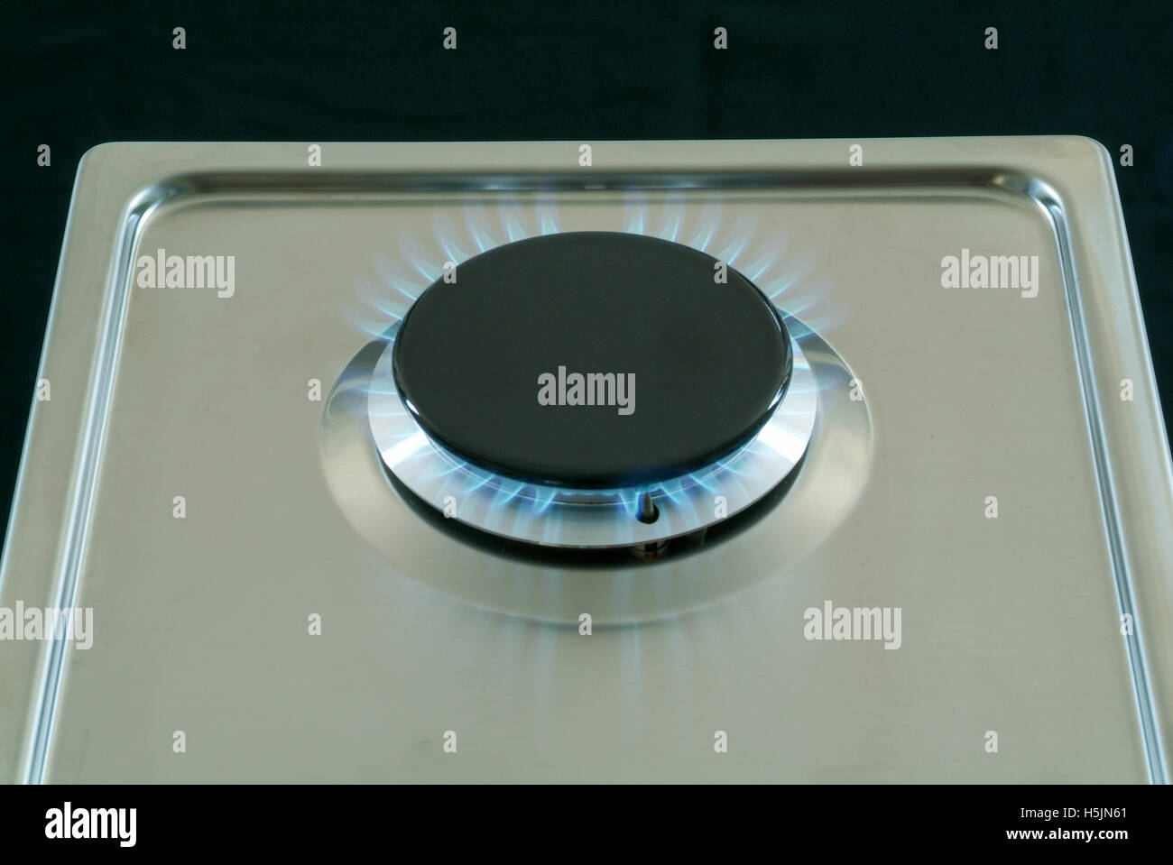 Gas burning from a kitchen gas stove Stock Photo - Alamy