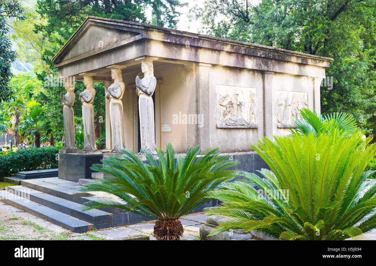 The antique styled crypt on the old city cemetery decorated with ...