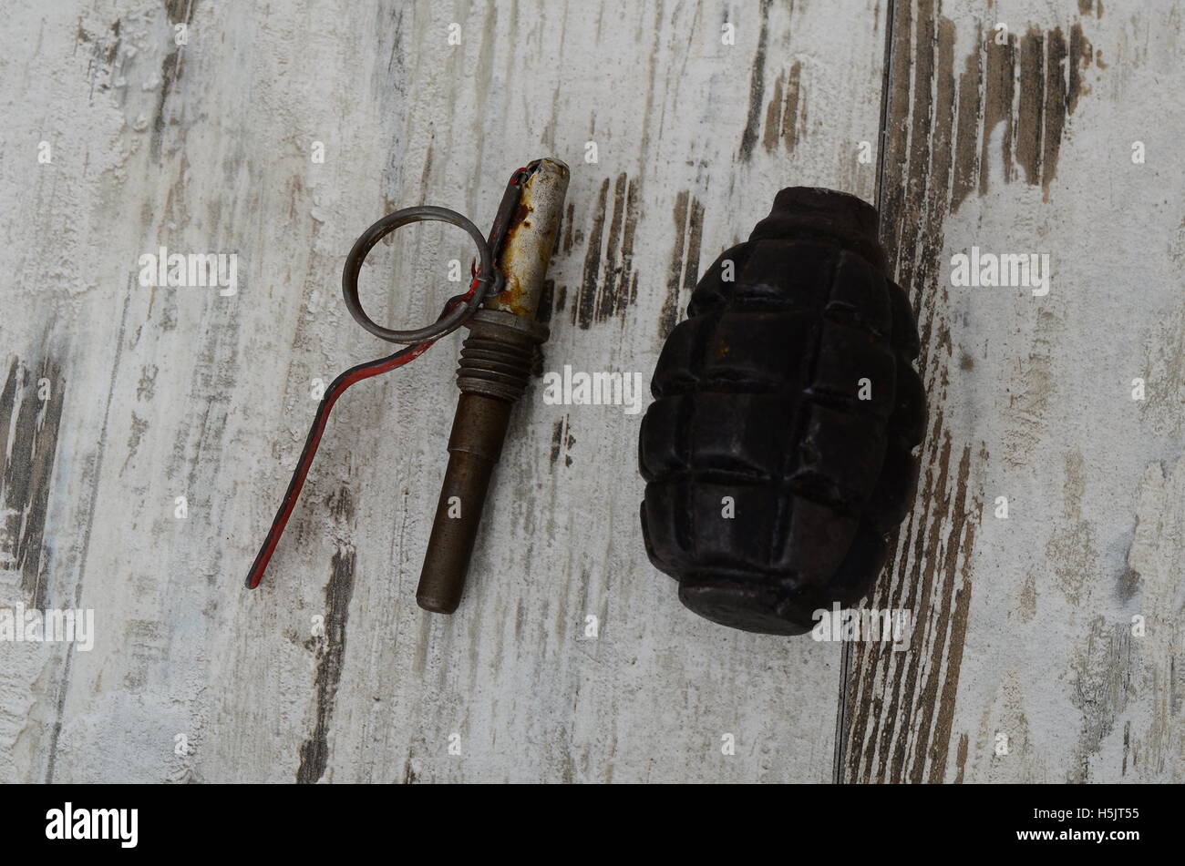 Old Hand Grenade on wood background. disguise, alarm Stock Photo - Alamy