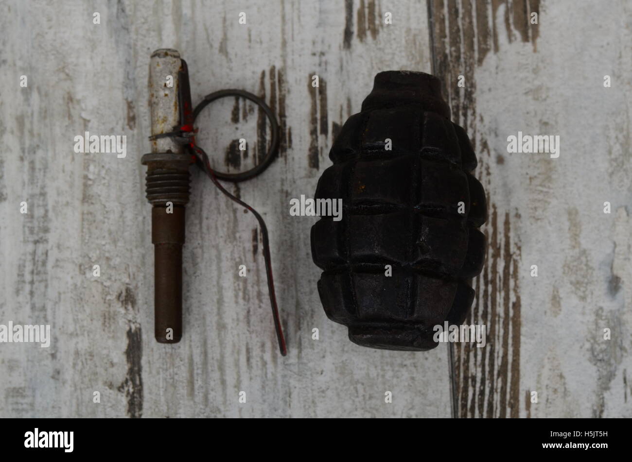 Old Hand Grenade on wood background. disguise, alarm Stock Photo - Alamy