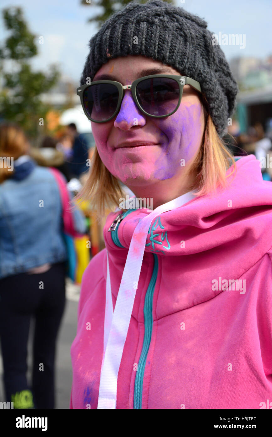 Beautiful girl at color running race Stock Photo - Alamy