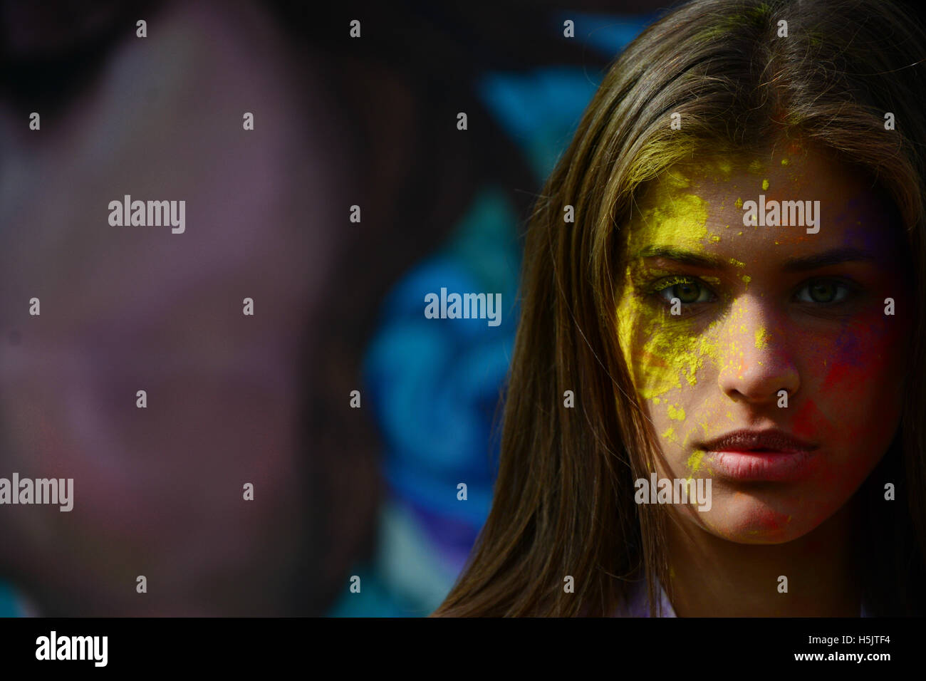 Beautiful girl at color running race Stock Photo - Alamy