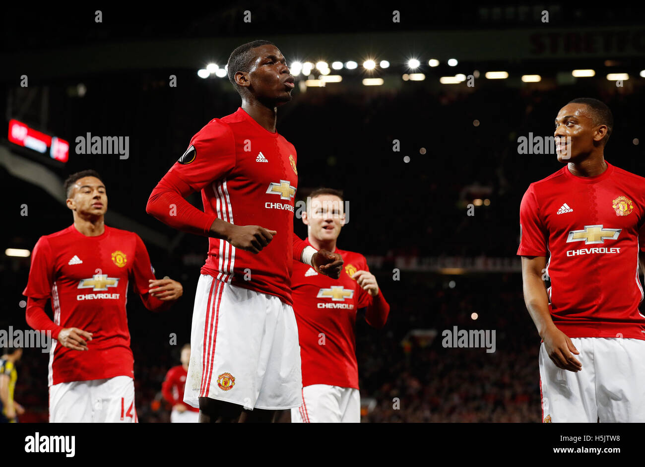 Manchester United's Paul Pogba (second left) celebrates scoring his ...