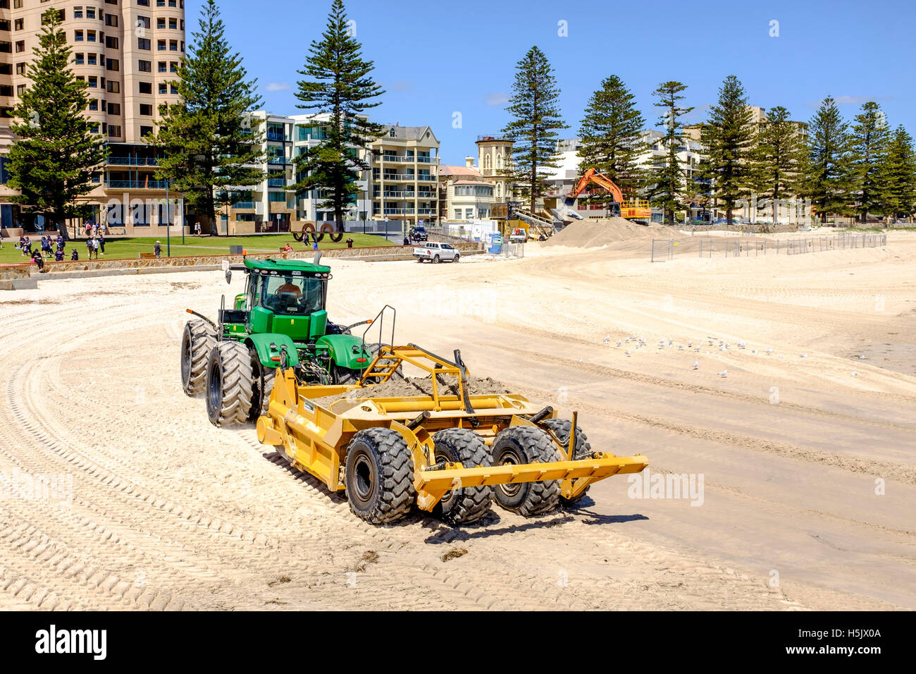 Sand replenishment cleaning and grading at Glenelg Beach Adelaide Stock ...