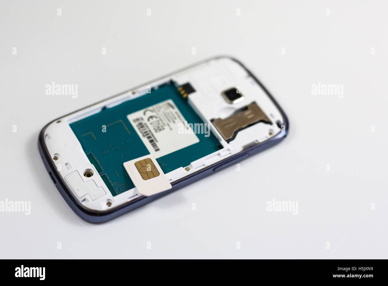 Open back of the modern phone Stock Photo - Alamy