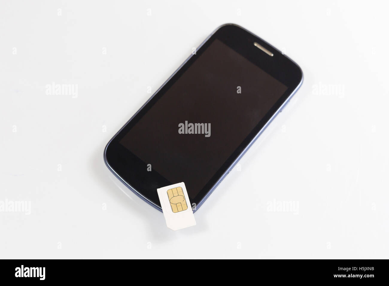 Modern smart phone with sim card Stock Photo - Alamy