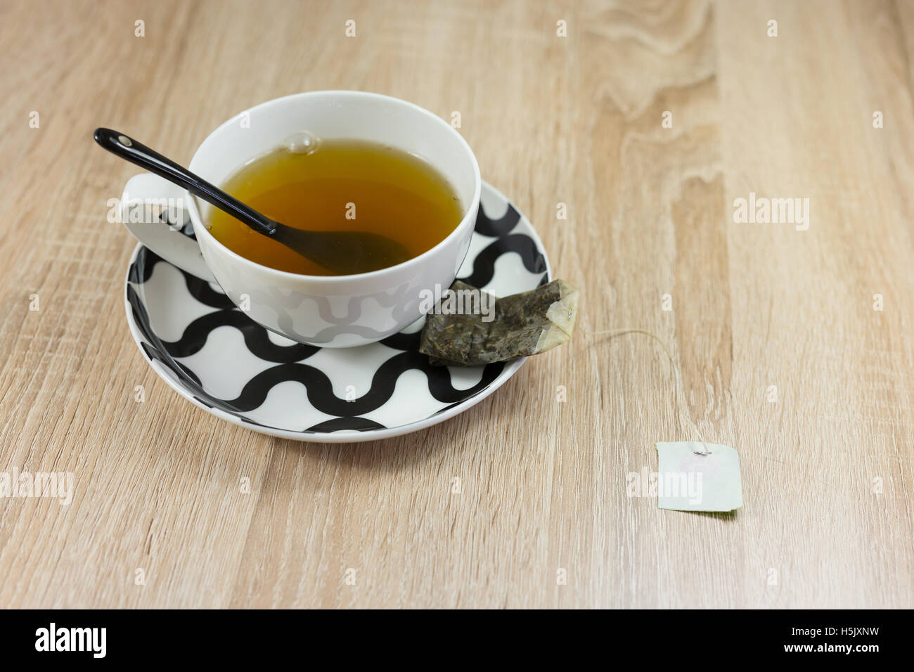Breakfast tea with chinese spoon Stock Photo - Alamy