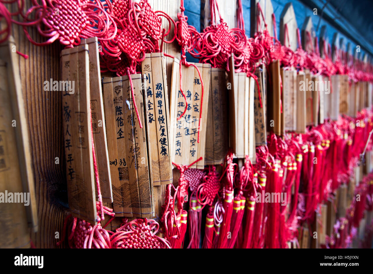 Red prayer sticks hi-res stock photography and images - Alamy