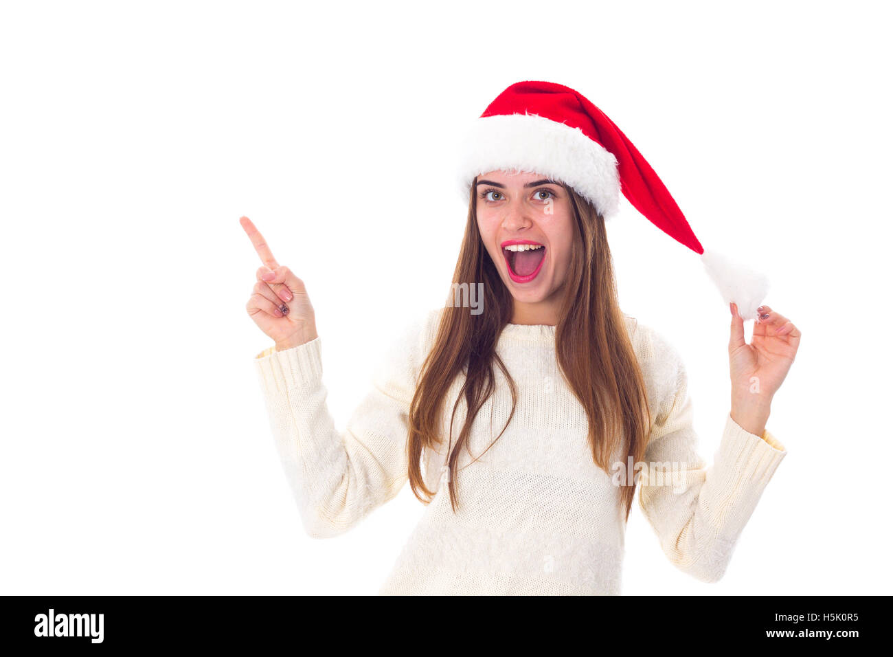 Woman in red christmas hat Stock Photo - Alamy