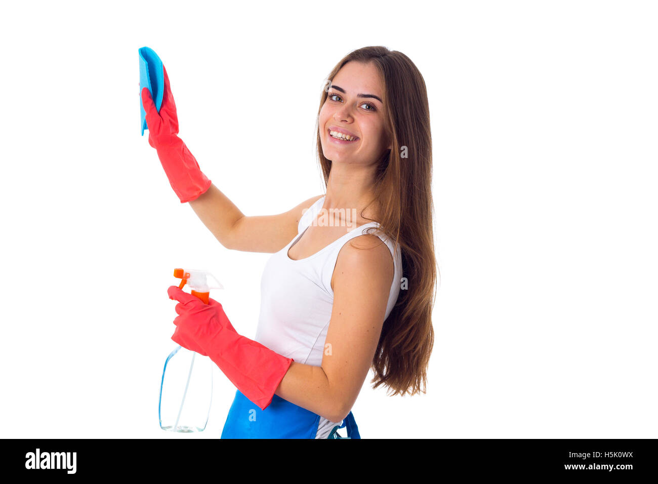 Woman using spray cleaner hi-res stock photography and images - Alamy