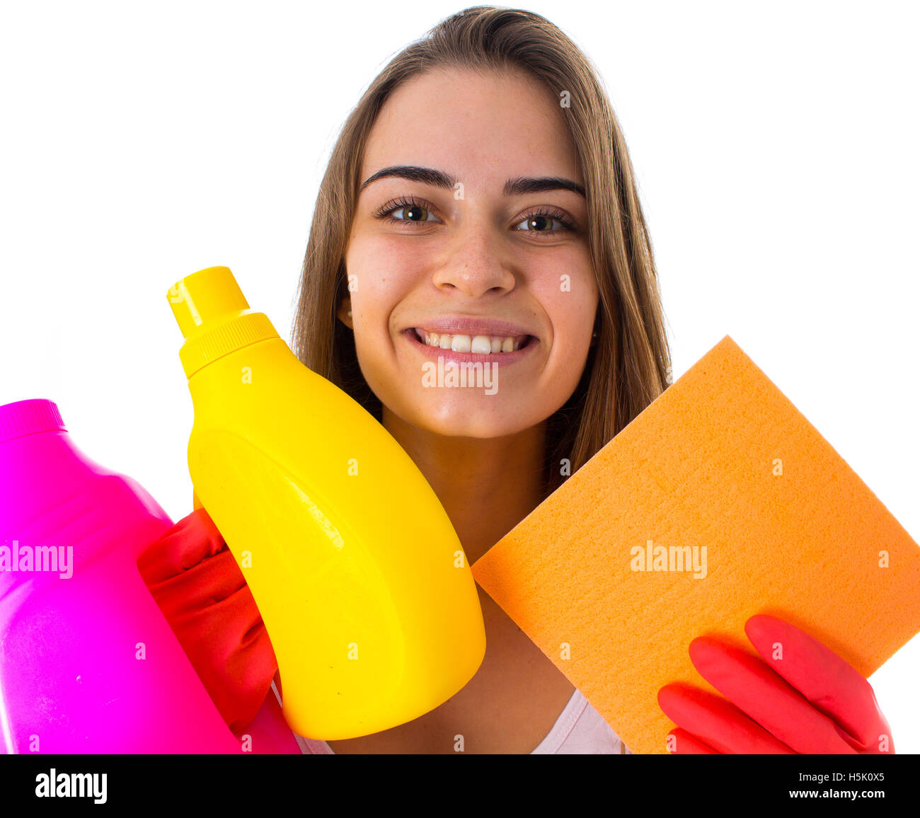 Woman holding duster and detergents Stock Photo - Alamy
