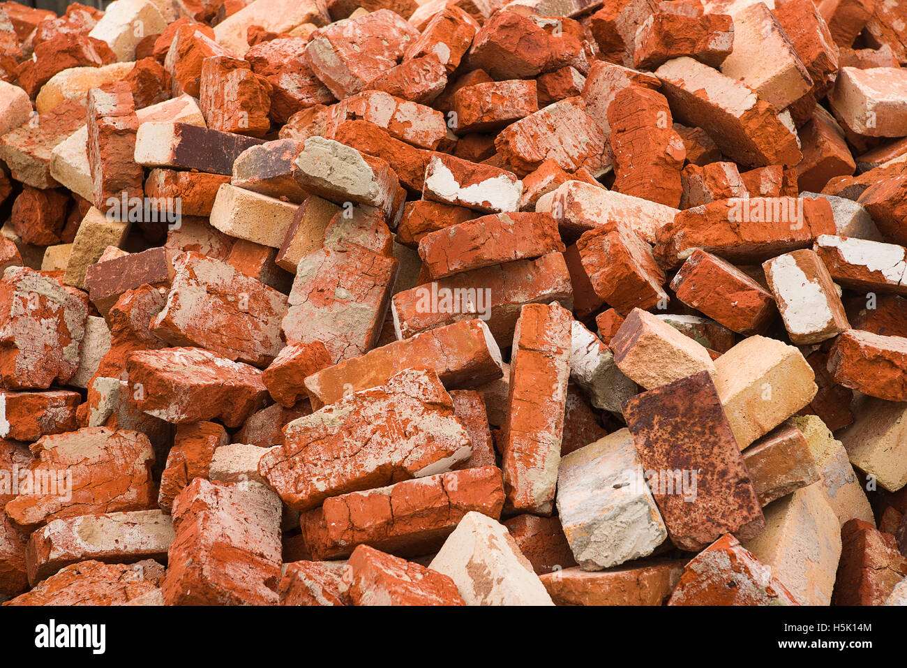 A lot of used bricks is lying big pile Stock Photo - Alamy