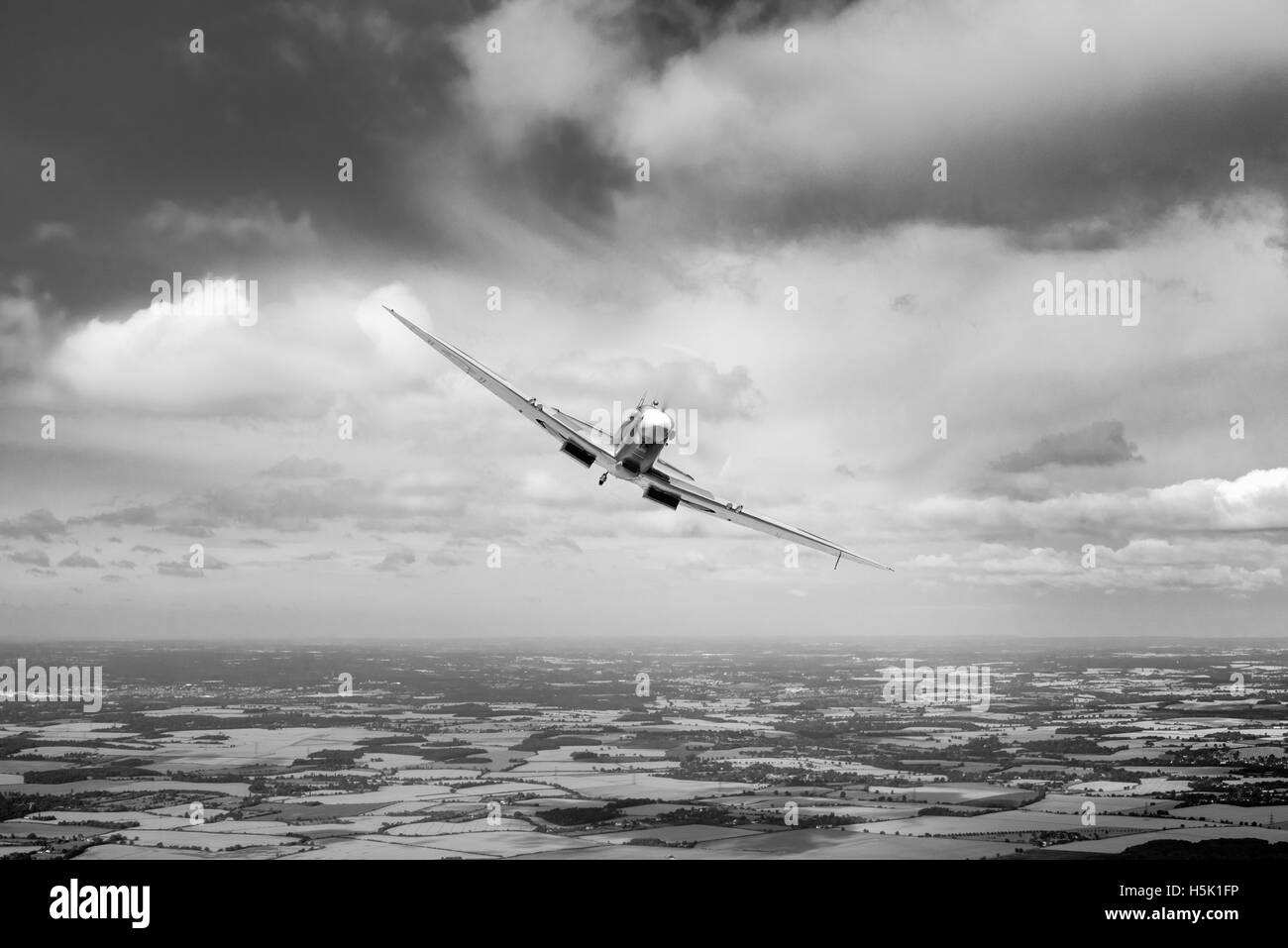 A Mk IX Supermarine Spitfire in RAF livery head-on in a sunlit late ...