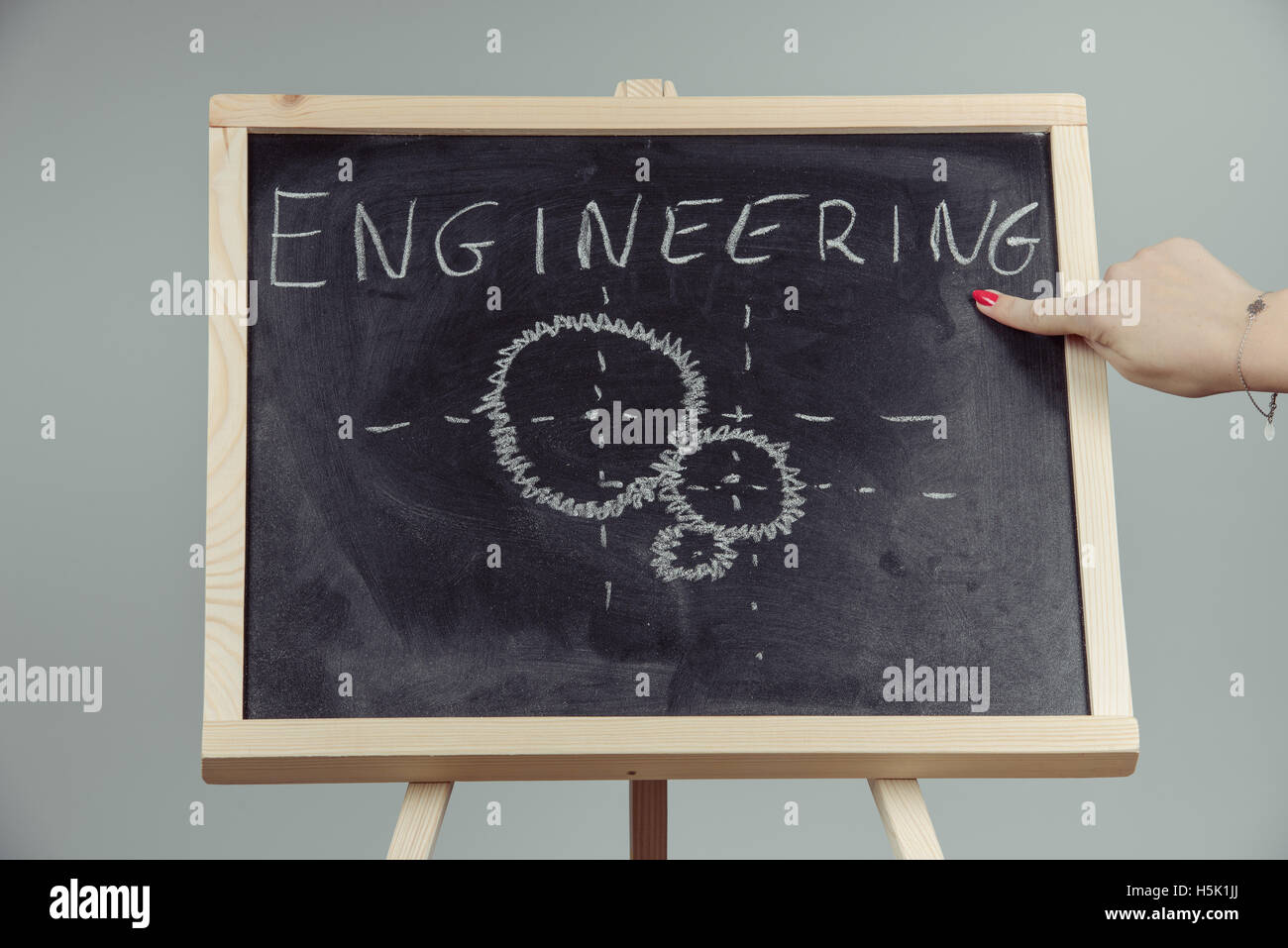 Engineering word handwritten on chalkboard. Gray background Stock Photo ...