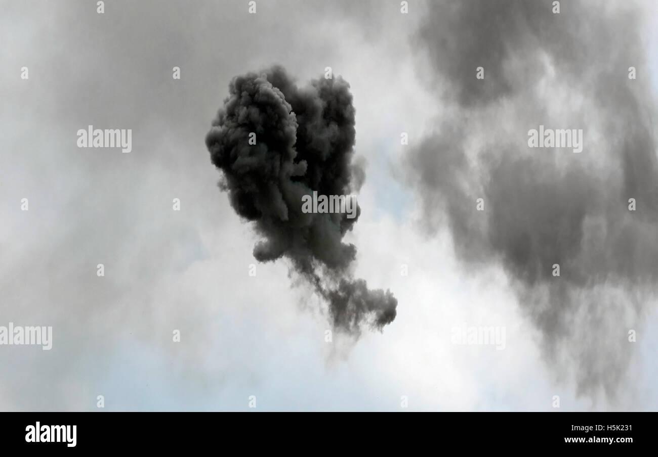 shocking black cloud after the explosion of the rocket in the sky Stock ...
