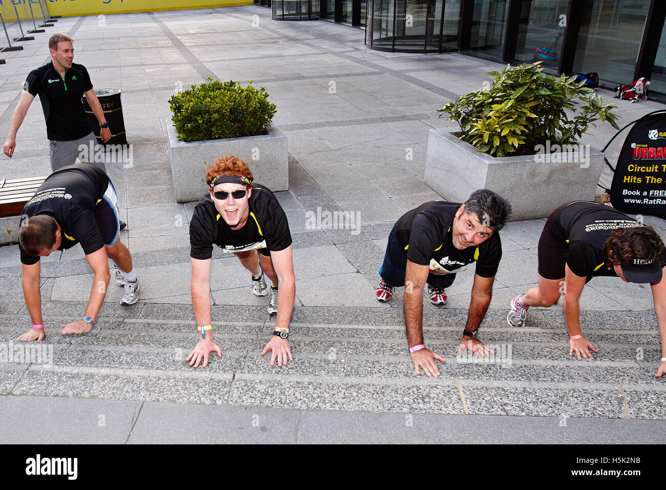 Competitors in the Rat Race Urban Adventure around the streets of ...