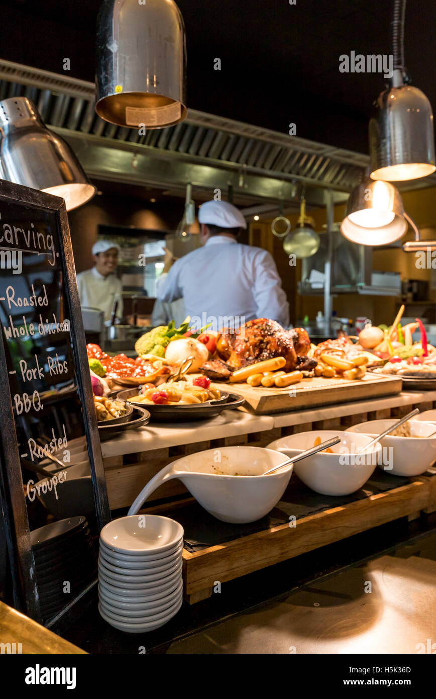 Food station with grilled carving food with kitchen working background ...