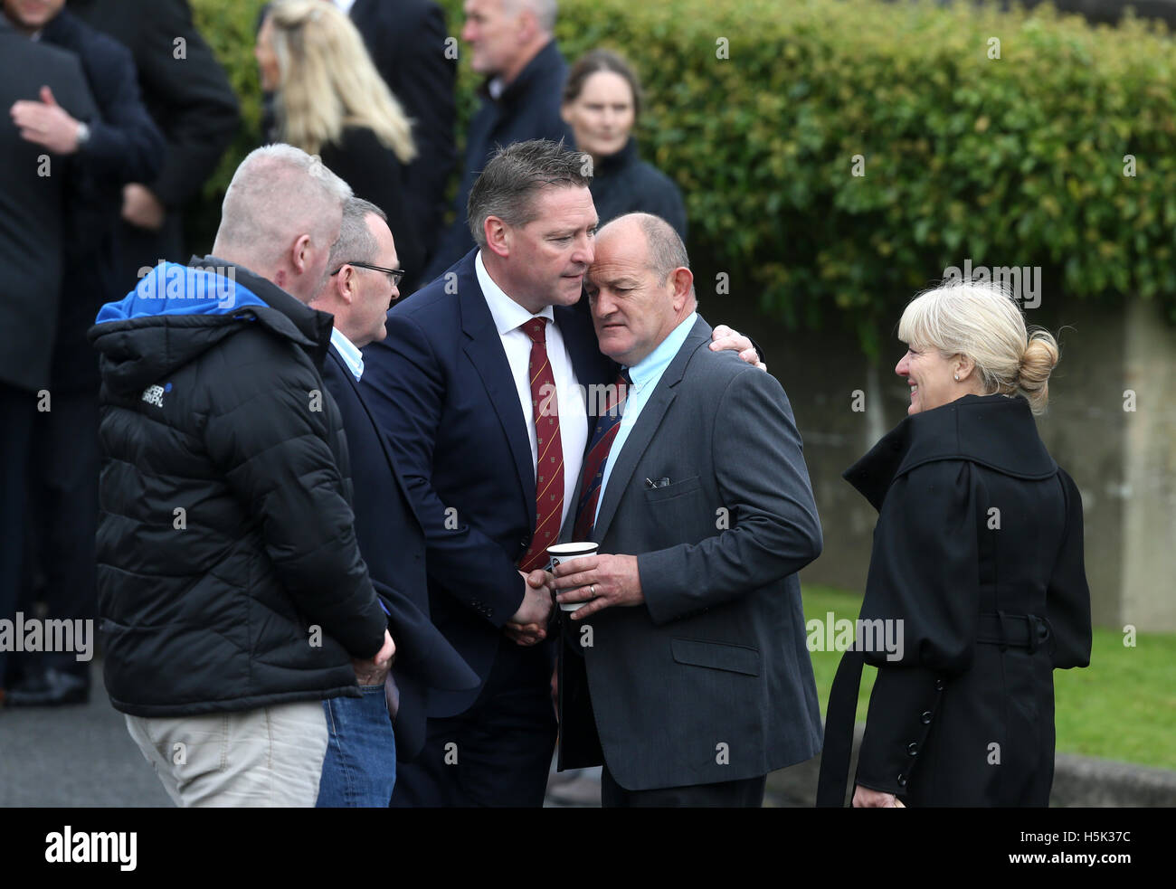 Former Munster and Ireland player Peter Clohessy (second right) arrives ...