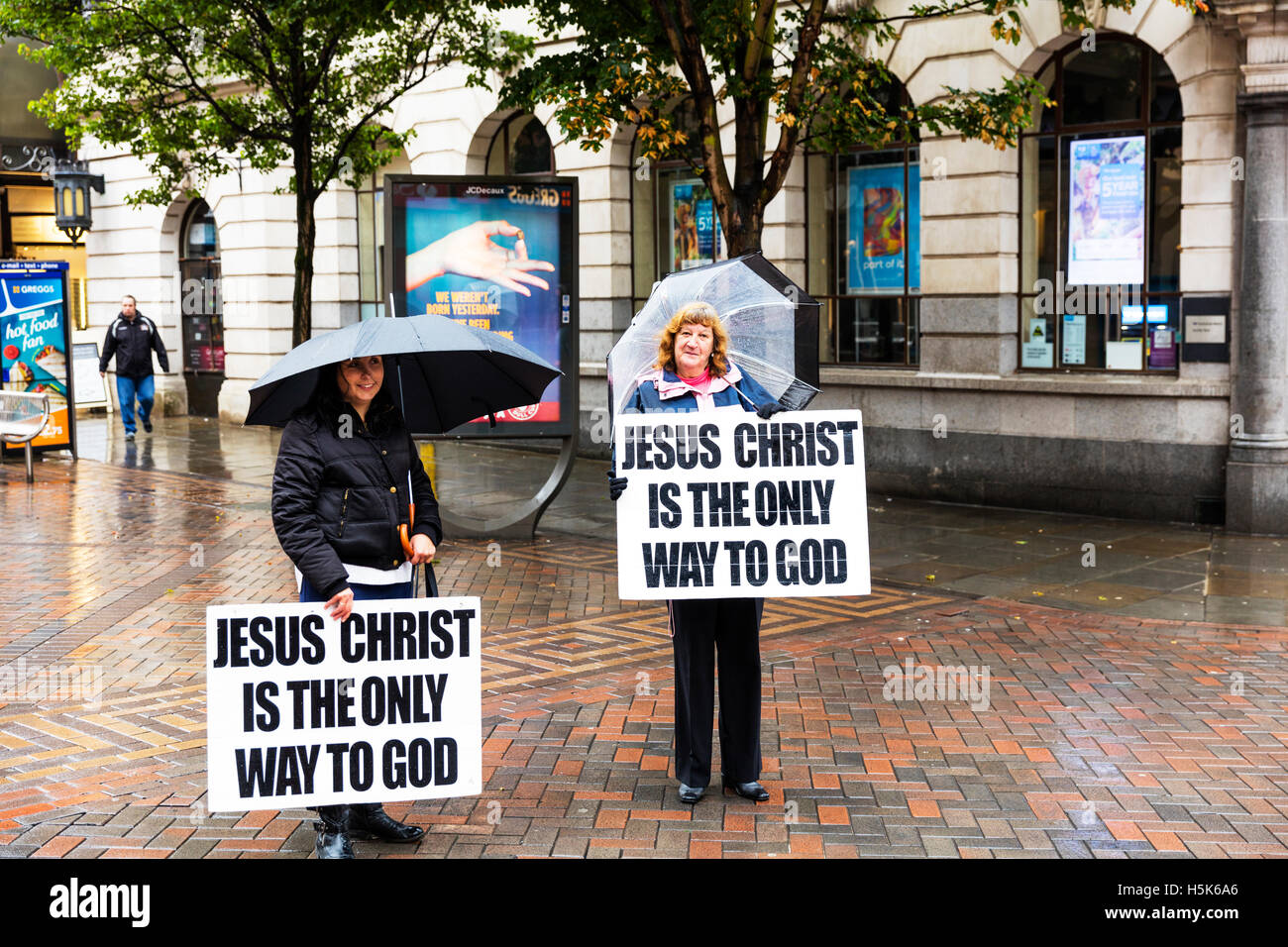 Religious preachers in city centre god Jesus christ signs god botherers ...
