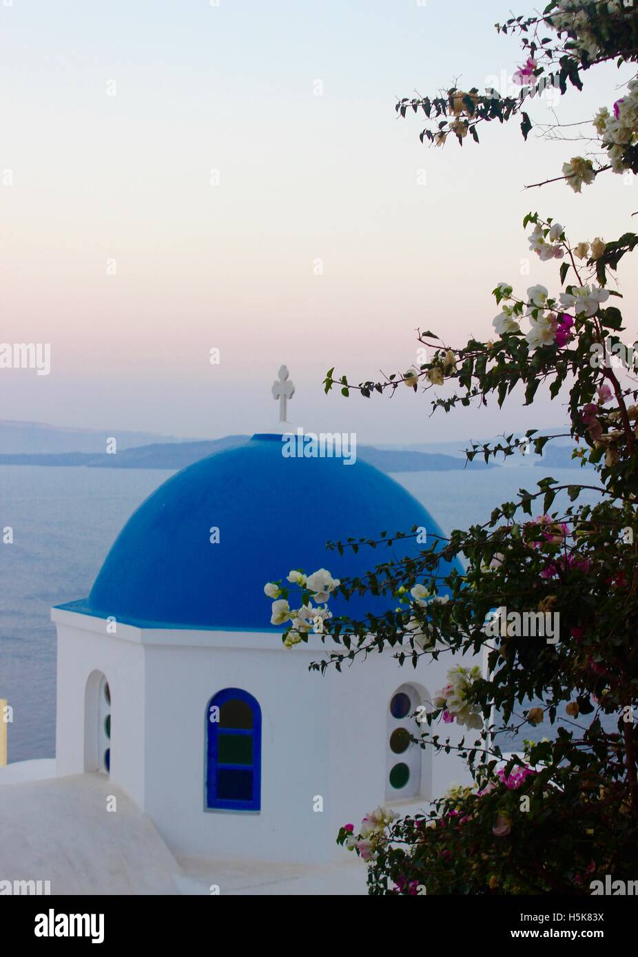 Santorini Blue Dome Sunset Stock Photo - Alamy
