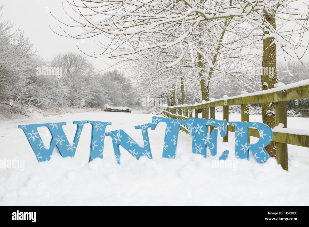 Winter letters in snow filled country lane Stock Photo - Alamy