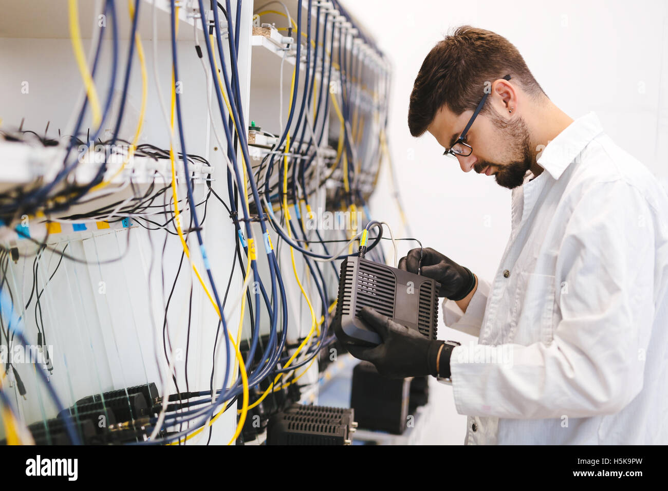Network engineer cables hi-res stock photography and images - Alamy
