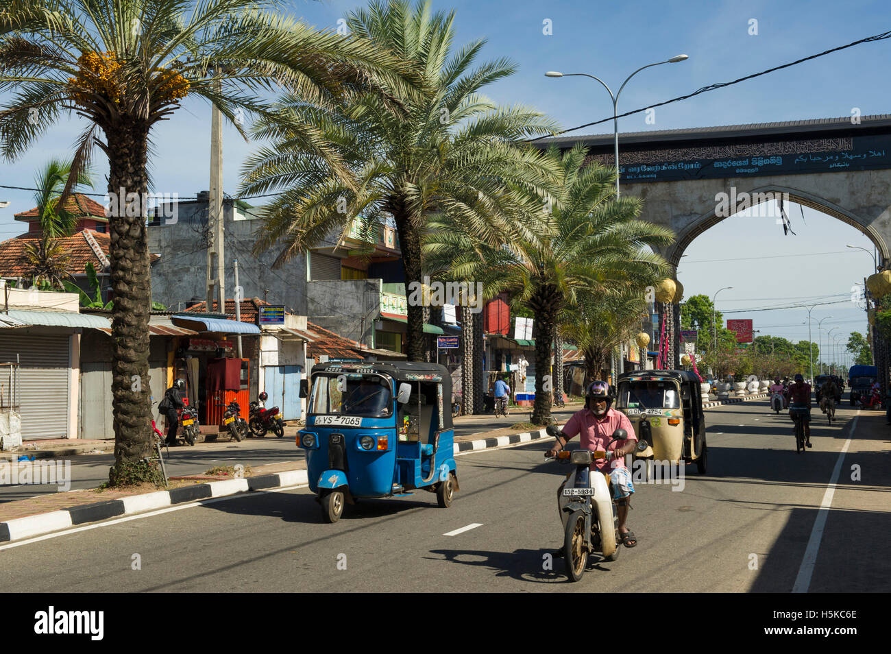 Palm-lined arched avenue at the gateway of Kattankudy, Sri Lanka Stock ...