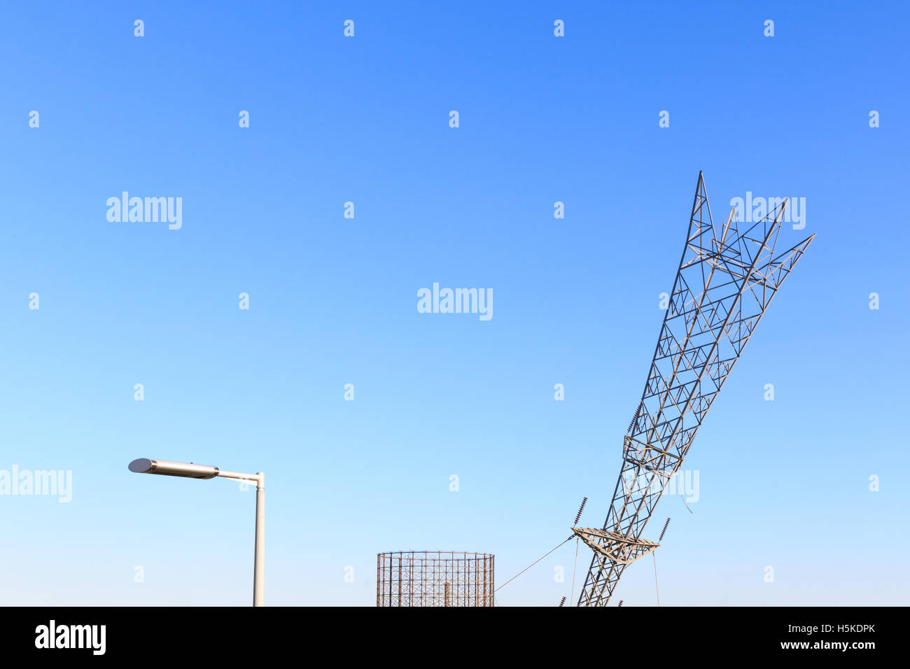 Lamppost, gas holder and upside down electricity pylon in Greenwich ...