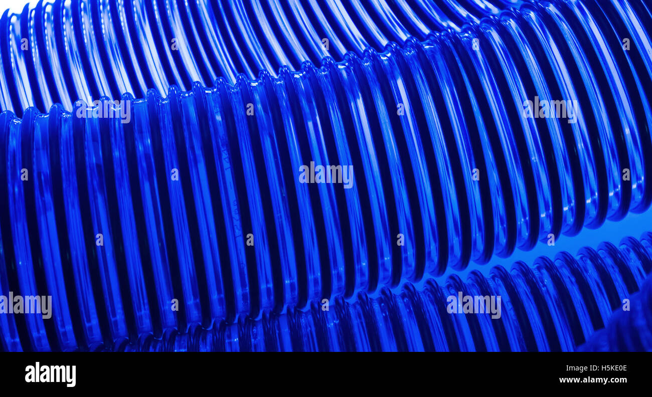 Corrugated blue vacuum tube Stock Photo - Alamy