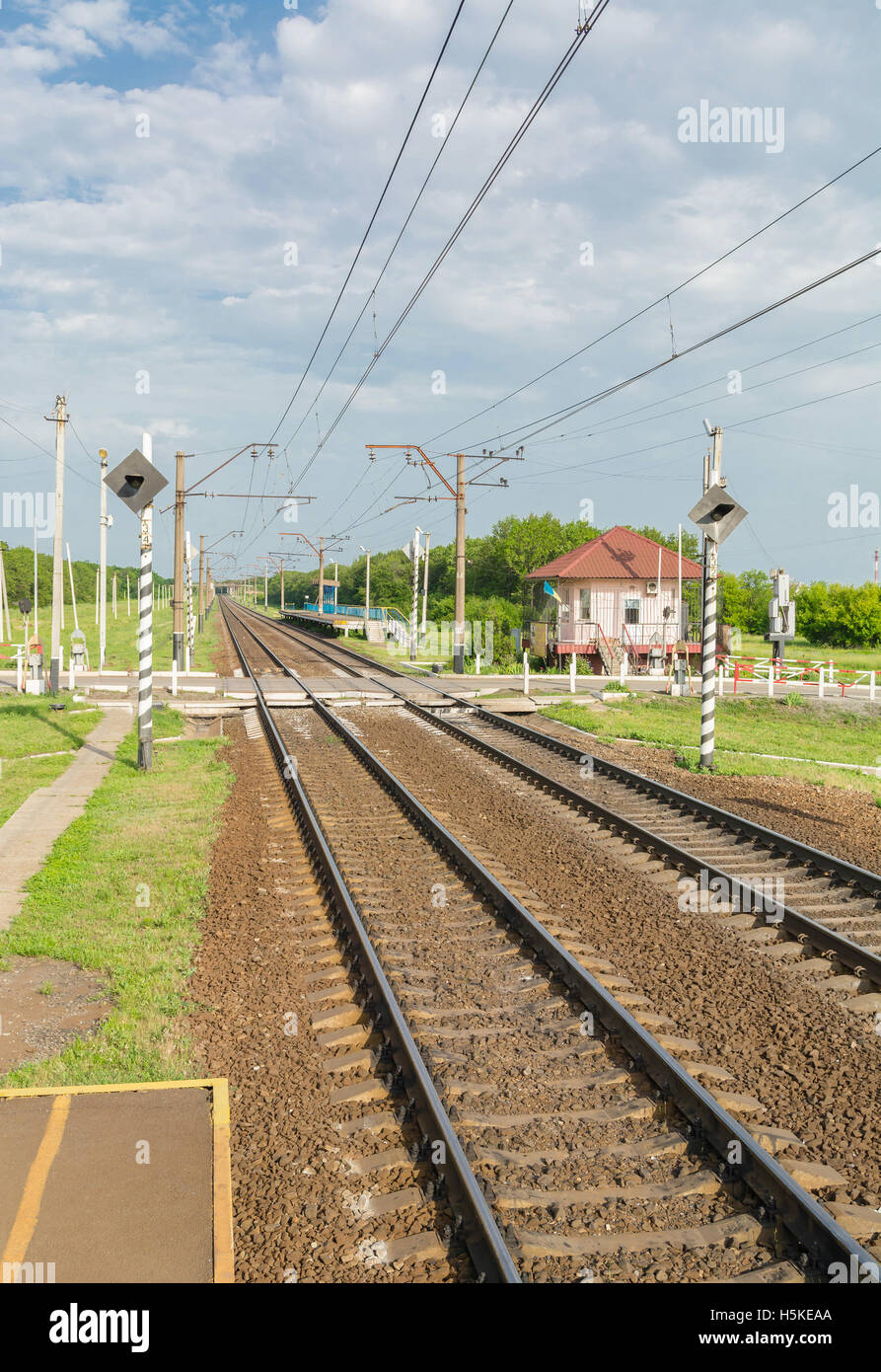 Railroad station, railroad tracks and a platform for trains Stock Photo ...