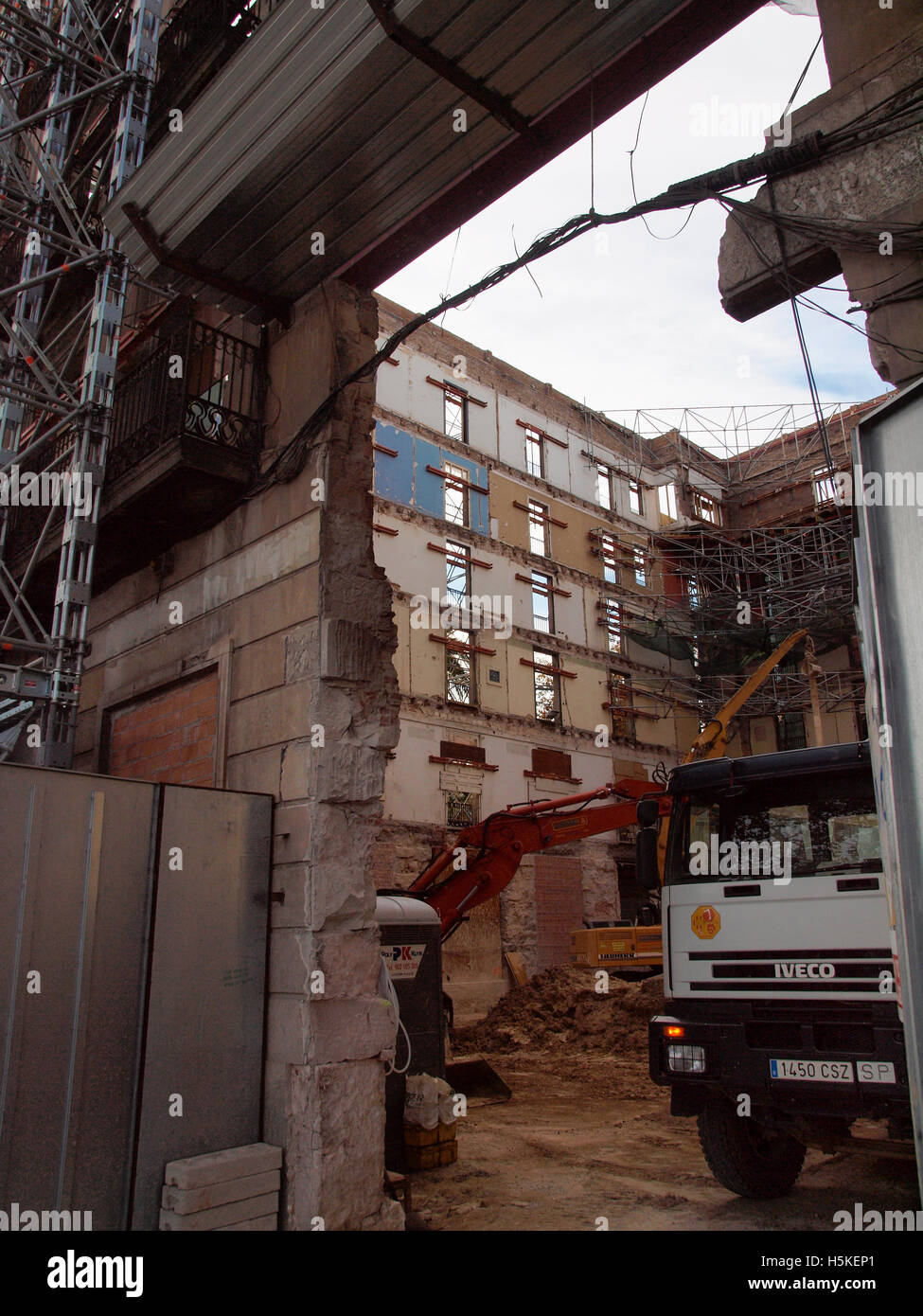 PROPERTY UNDER REDEVELOPMENT WITH SUPPORTED SHELL OF MAIN WALLS ...