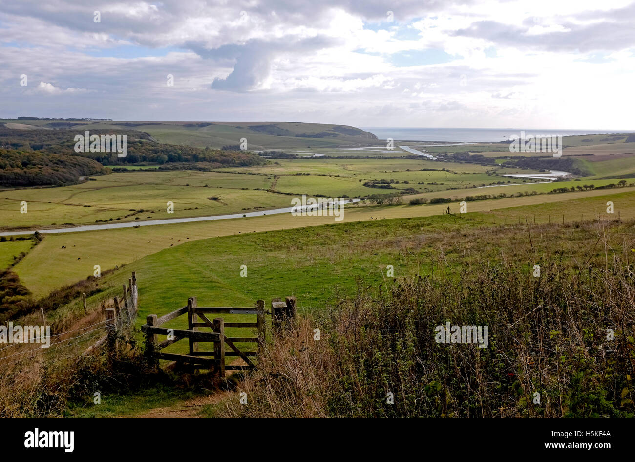 Cuckmere Haven lies on the coast and is an area of flood plains where ...