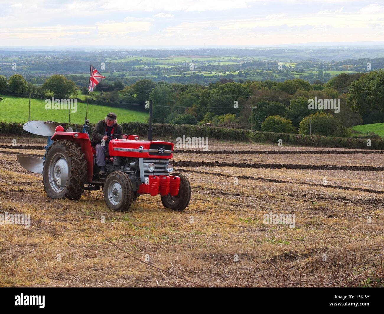 Farmer flying the Union Jack flag from his tractor. Taken at Ashover ...