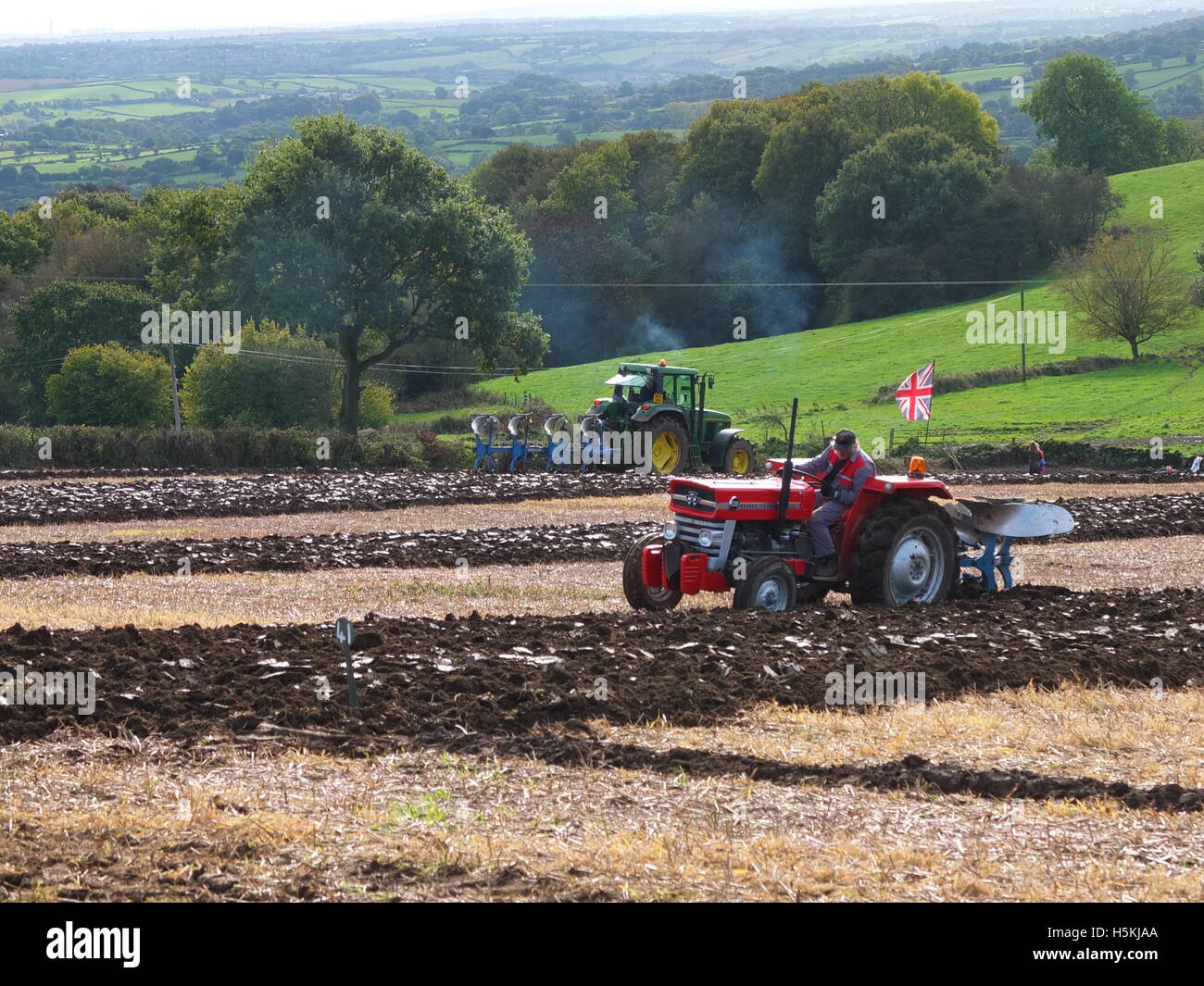 A farmer flying the Union Jack flag from his tractor competing in the ...