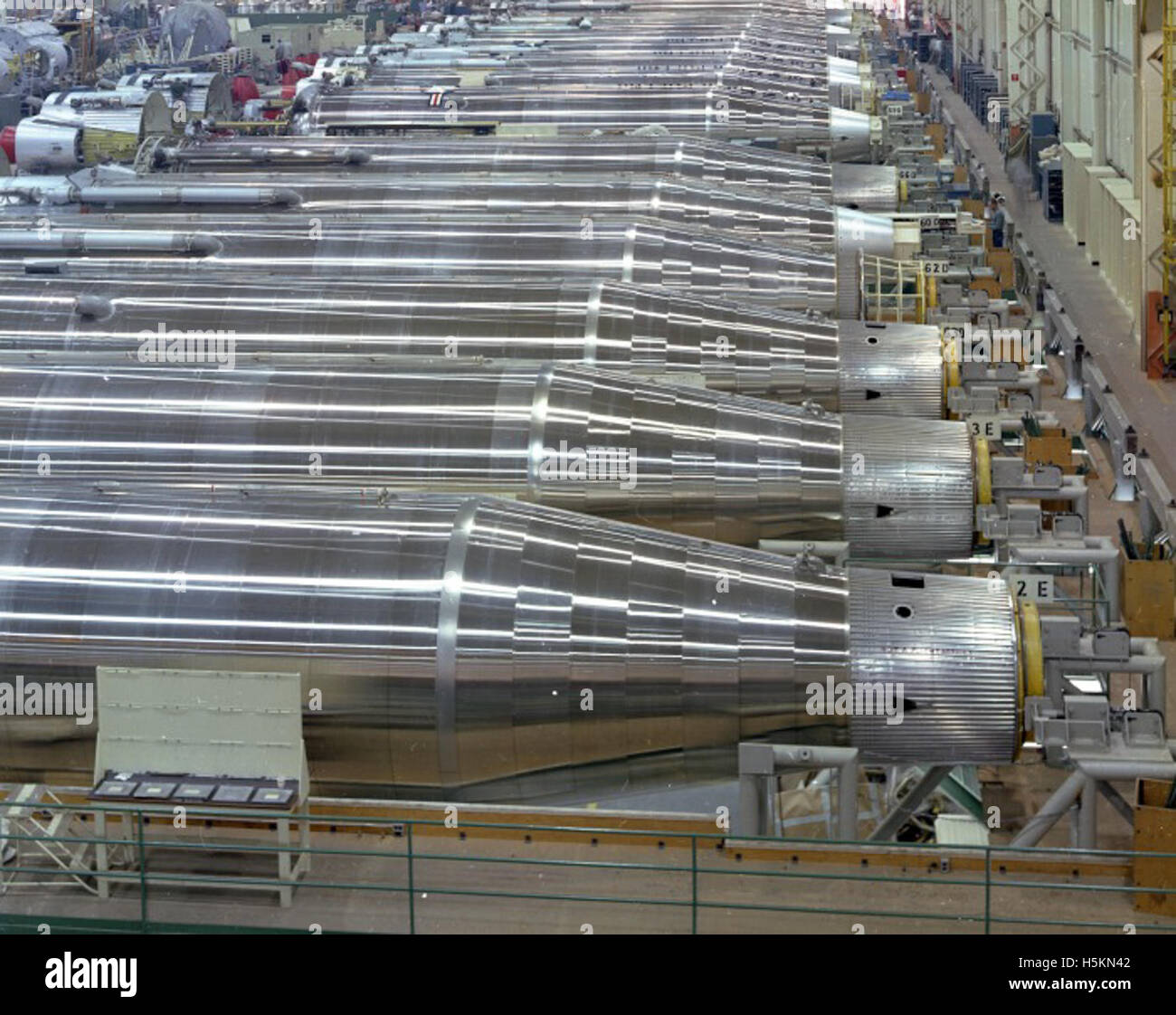 A photograph showing a rocket on the launch pad, with the exhaust plume ...