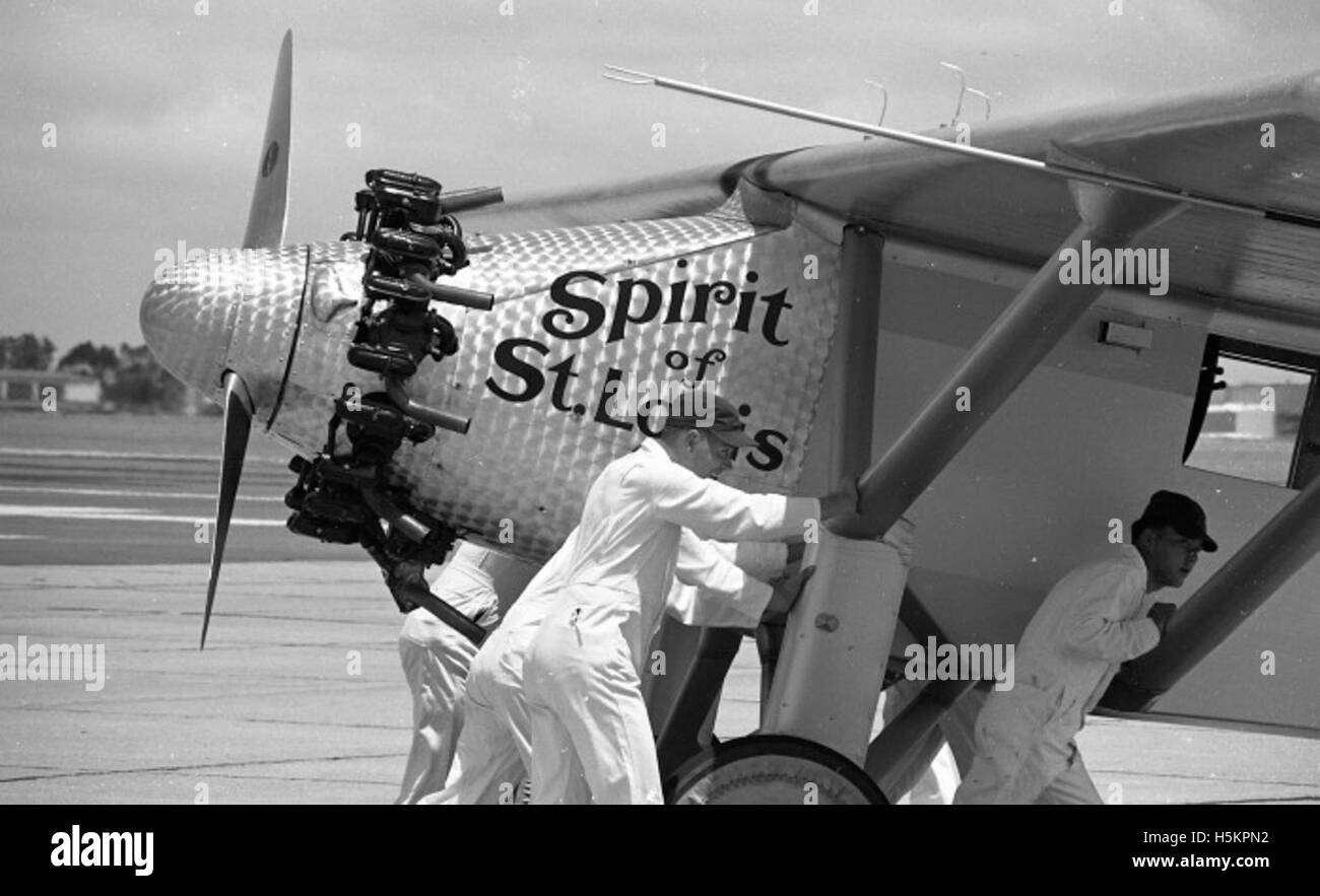 This image features a reproduction of the iconic Spirit of St. Louis ...