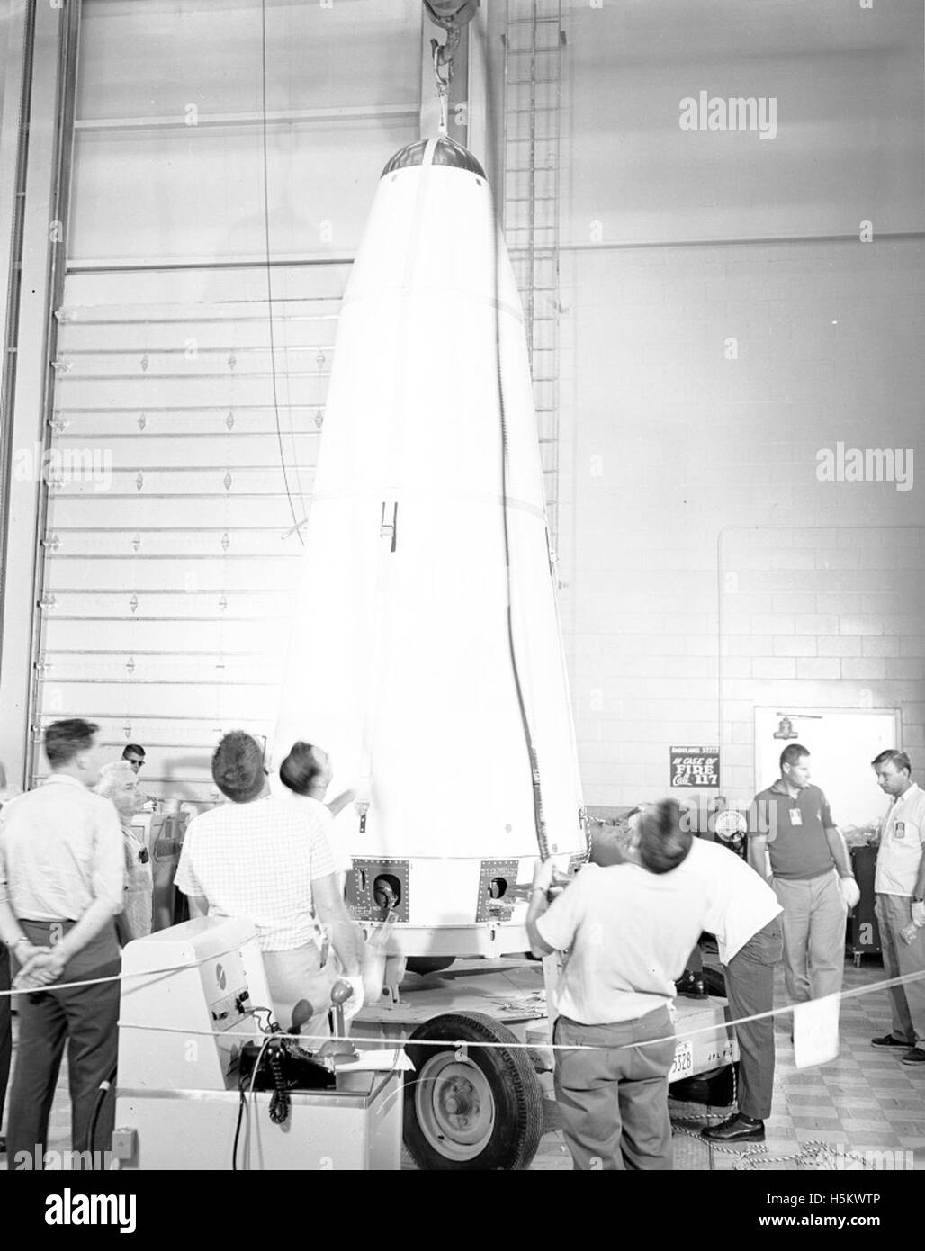 Atlas 111D Details Shroud being lowered on Agena Space craft Stock ...
