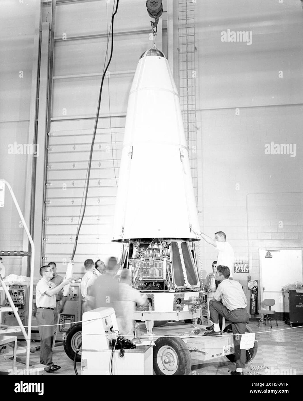 Atlas 111D Details Shroud being lowered on Agena Space craft Stock ...