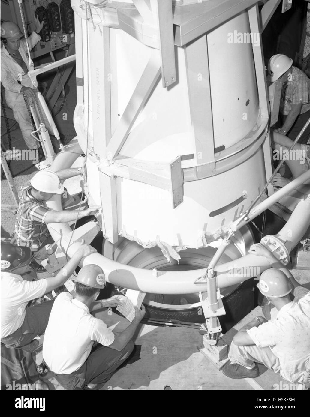 A photograph from the Atlas Collection showing the assembly process of ...