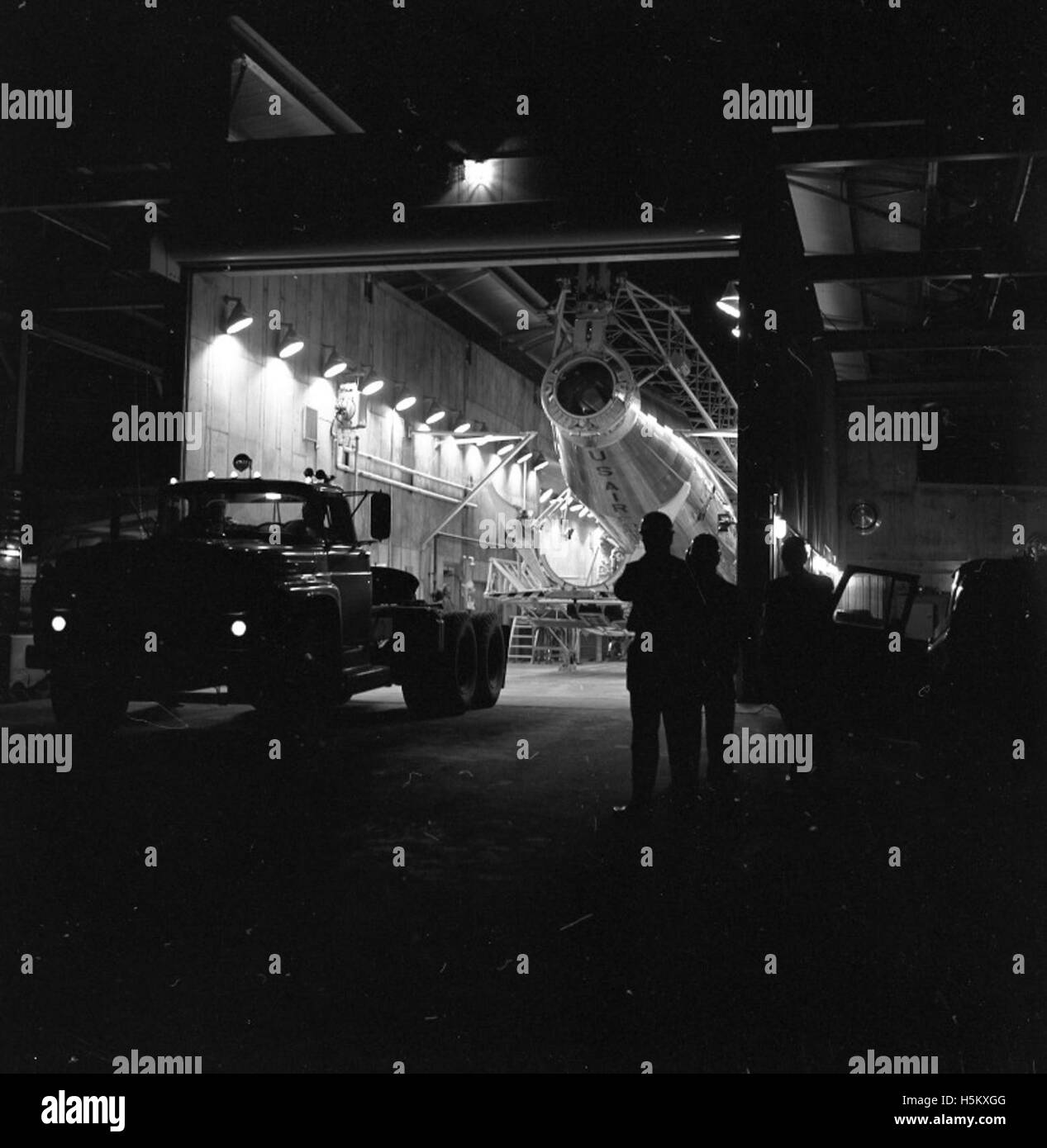 A photograph from the Atlas Collection showing engineers conducting a ...