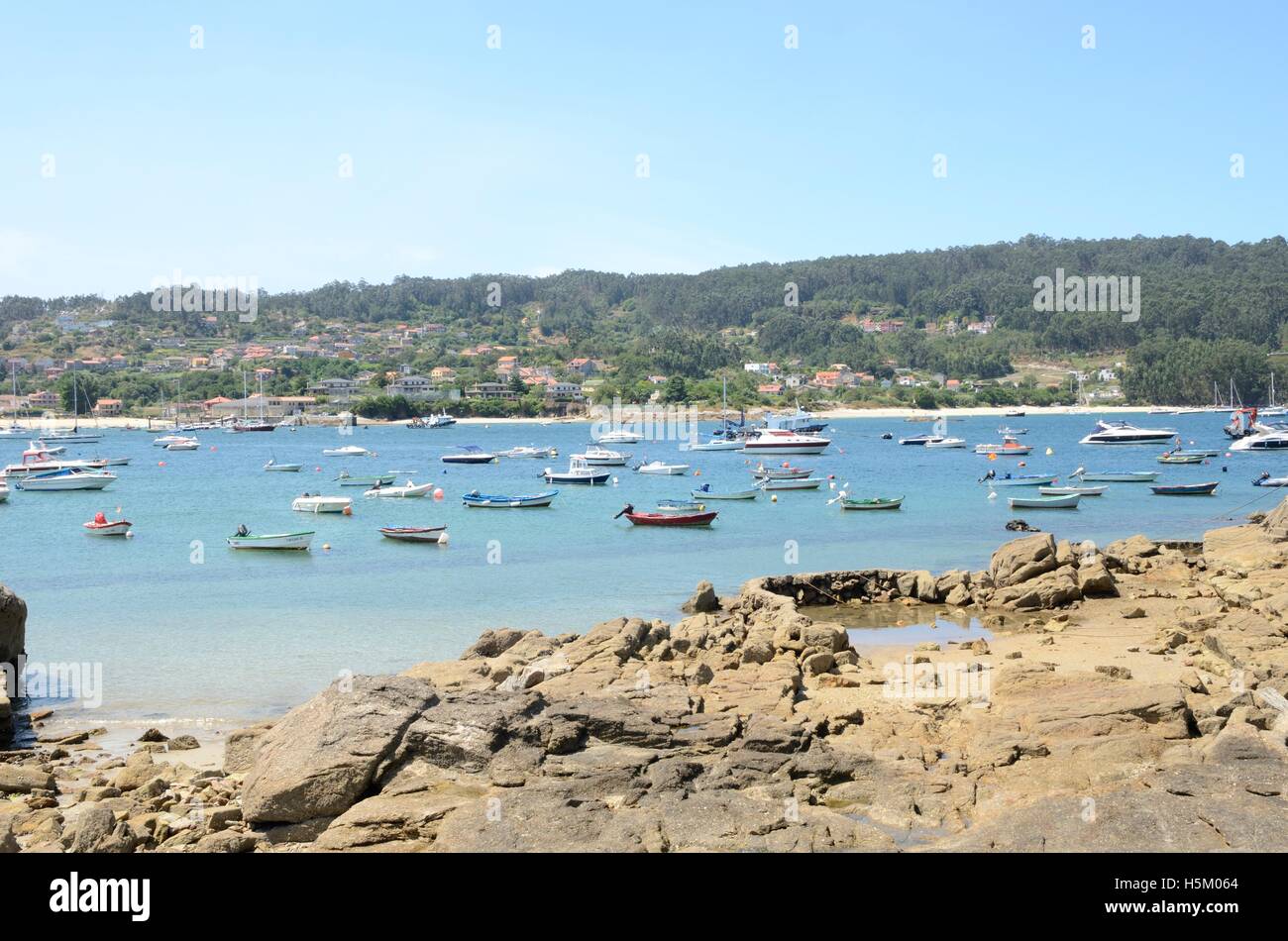 Boats at the sea in the fishing port of Aldan, in the province of ...