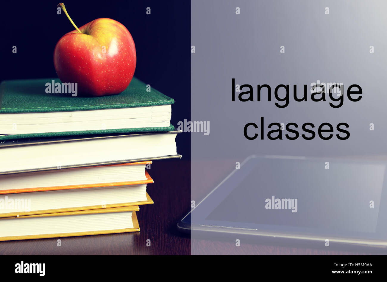language classes apple book stack Stock Photo - Alamy