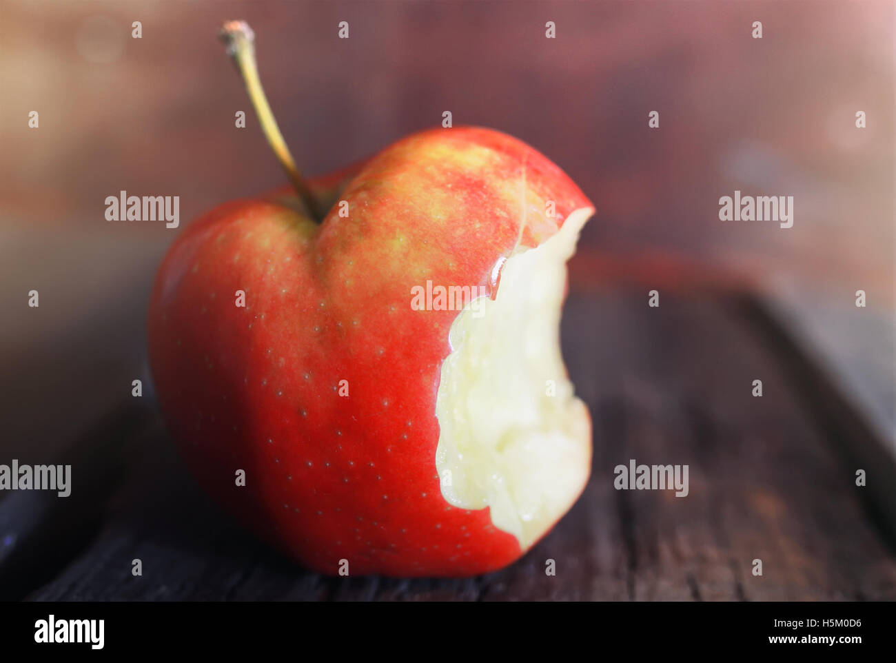 red bitten apple Stock Photo - Alamy